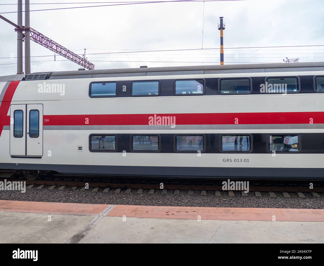 At the pier near the departing train. Train locomotive. Georgian ...