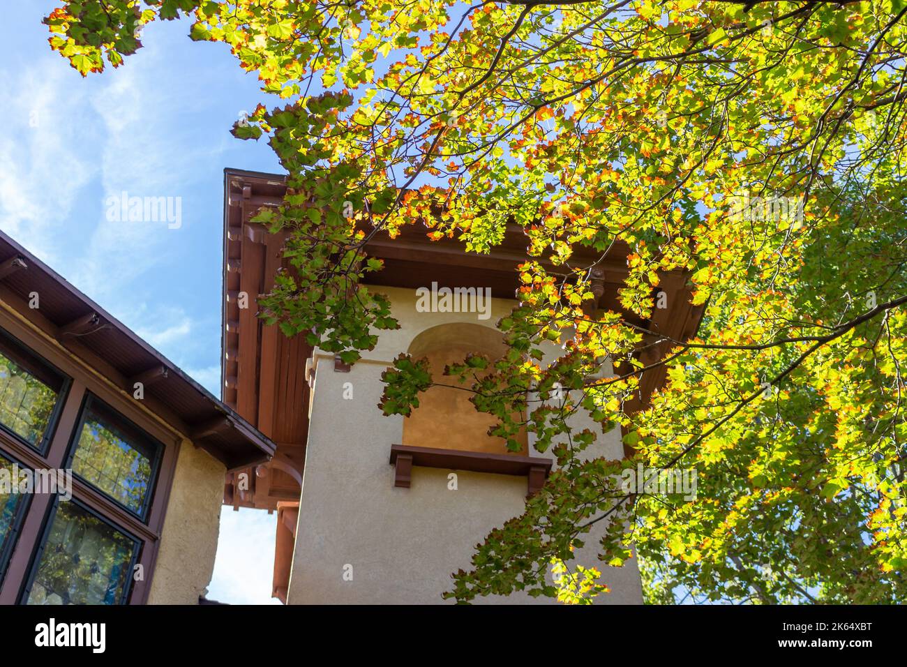 Upward architectural view of an early 20th century Spanish style church ...