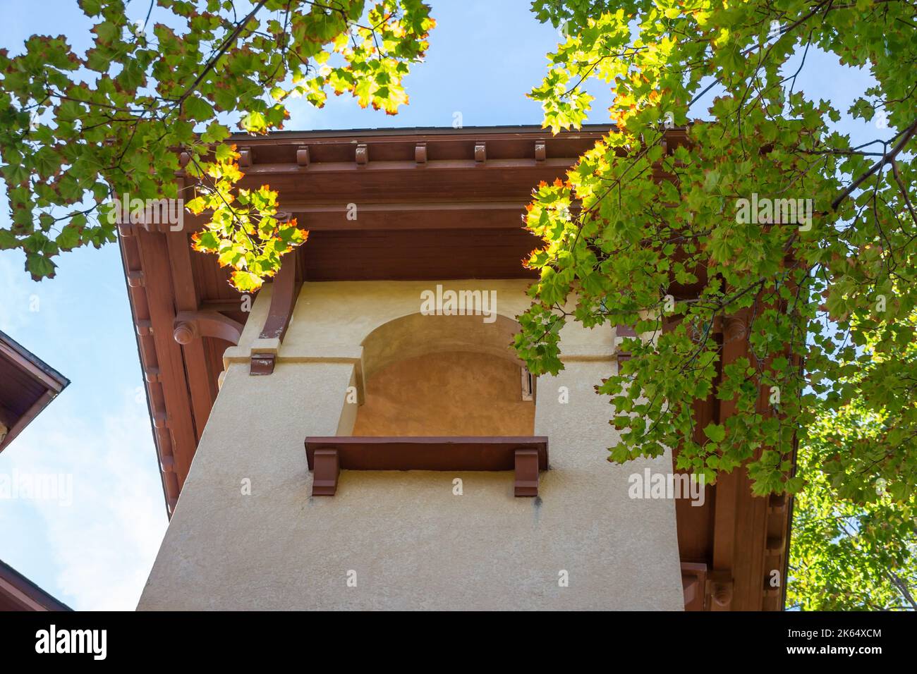 Upward architectural view of an early 20th century Spanish style church ...