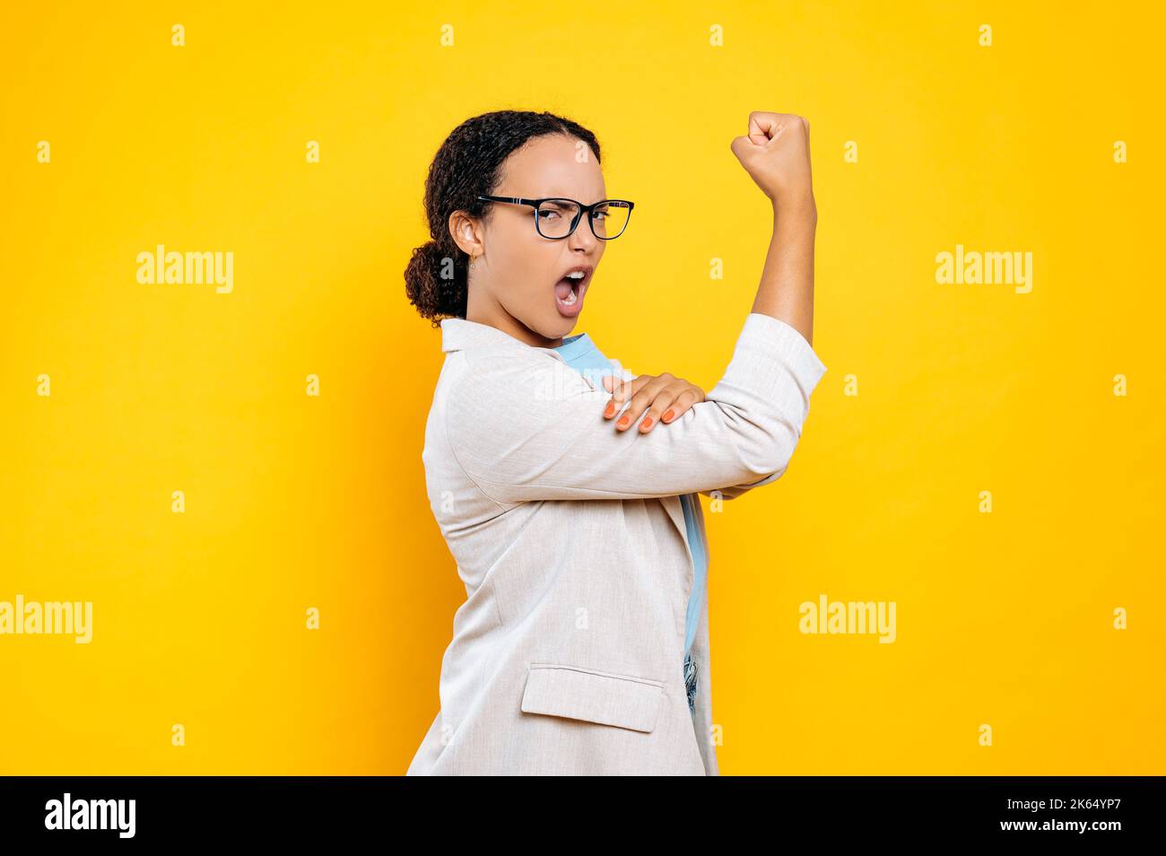 Amazed excited confident strong young brunette hispanic or brazilian ...