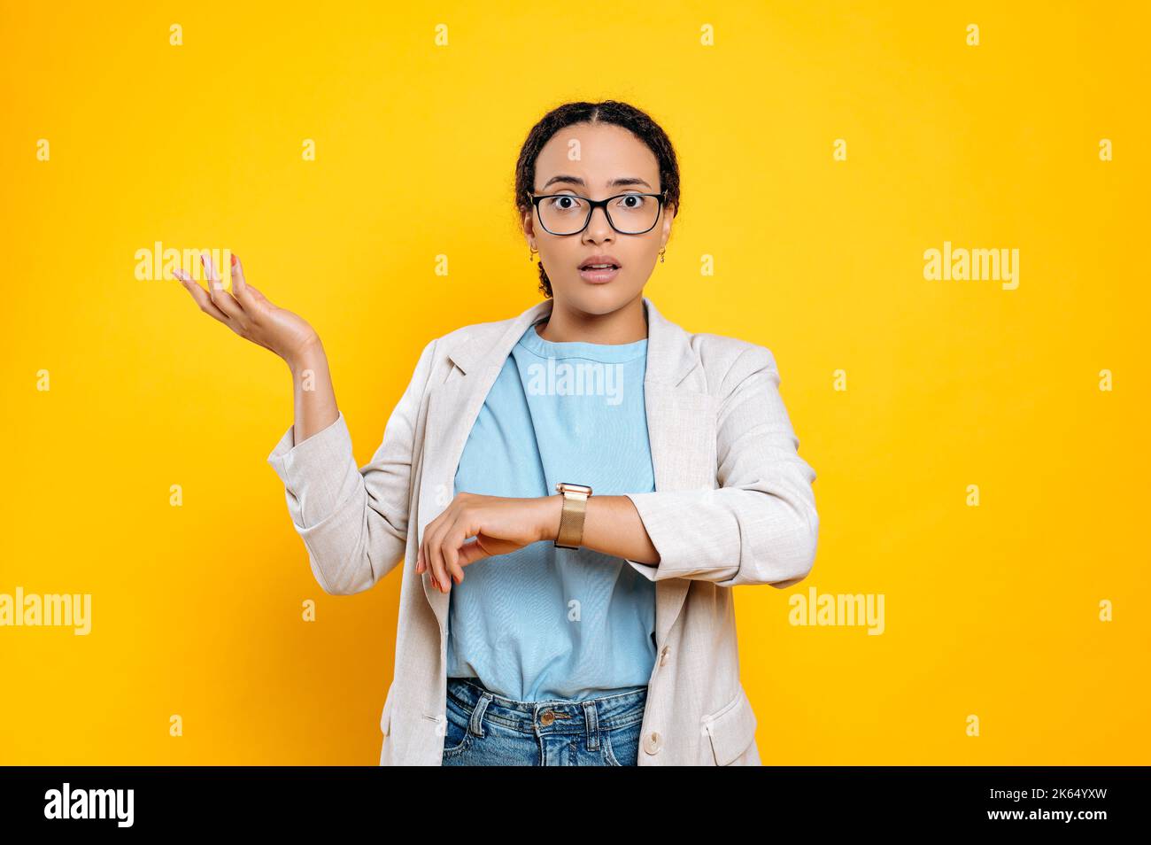 Confused puzzled hispanic or brazilian young woman, company employee ...