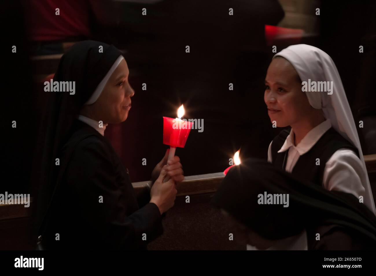 Vatican City, Vatican. 11th Oct, 2022. Nuns enlight candles at the end ...