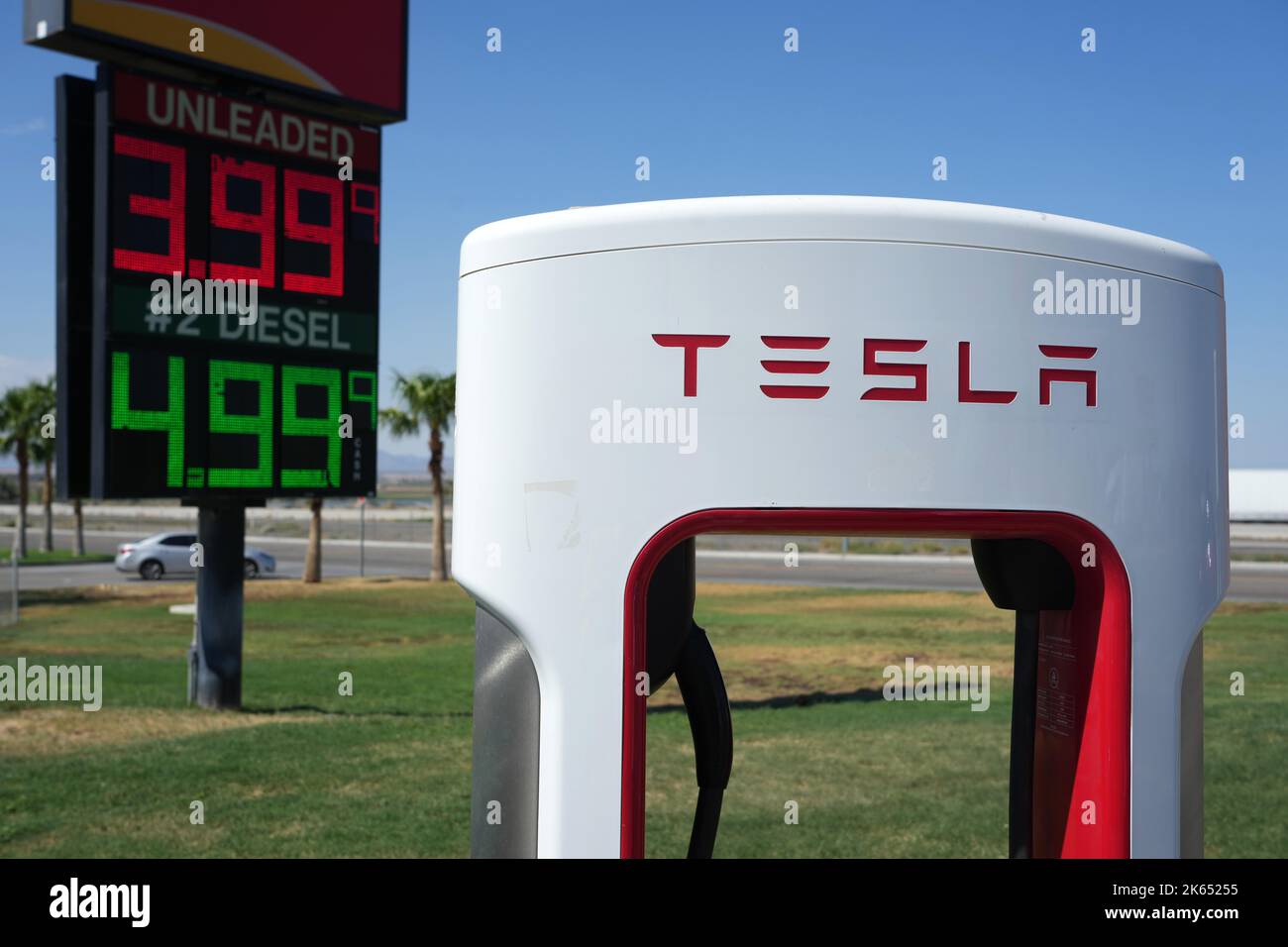A Tesla Supercharger station, Tuesday, Sept. 27, 2022, with gasoline ...
