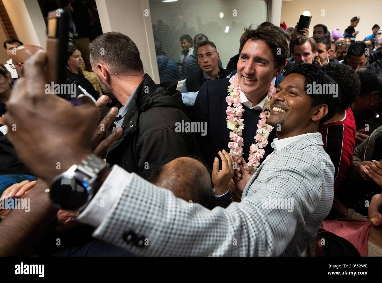 Prime Minister Justin Trudeau makes his way through the crowd during ...