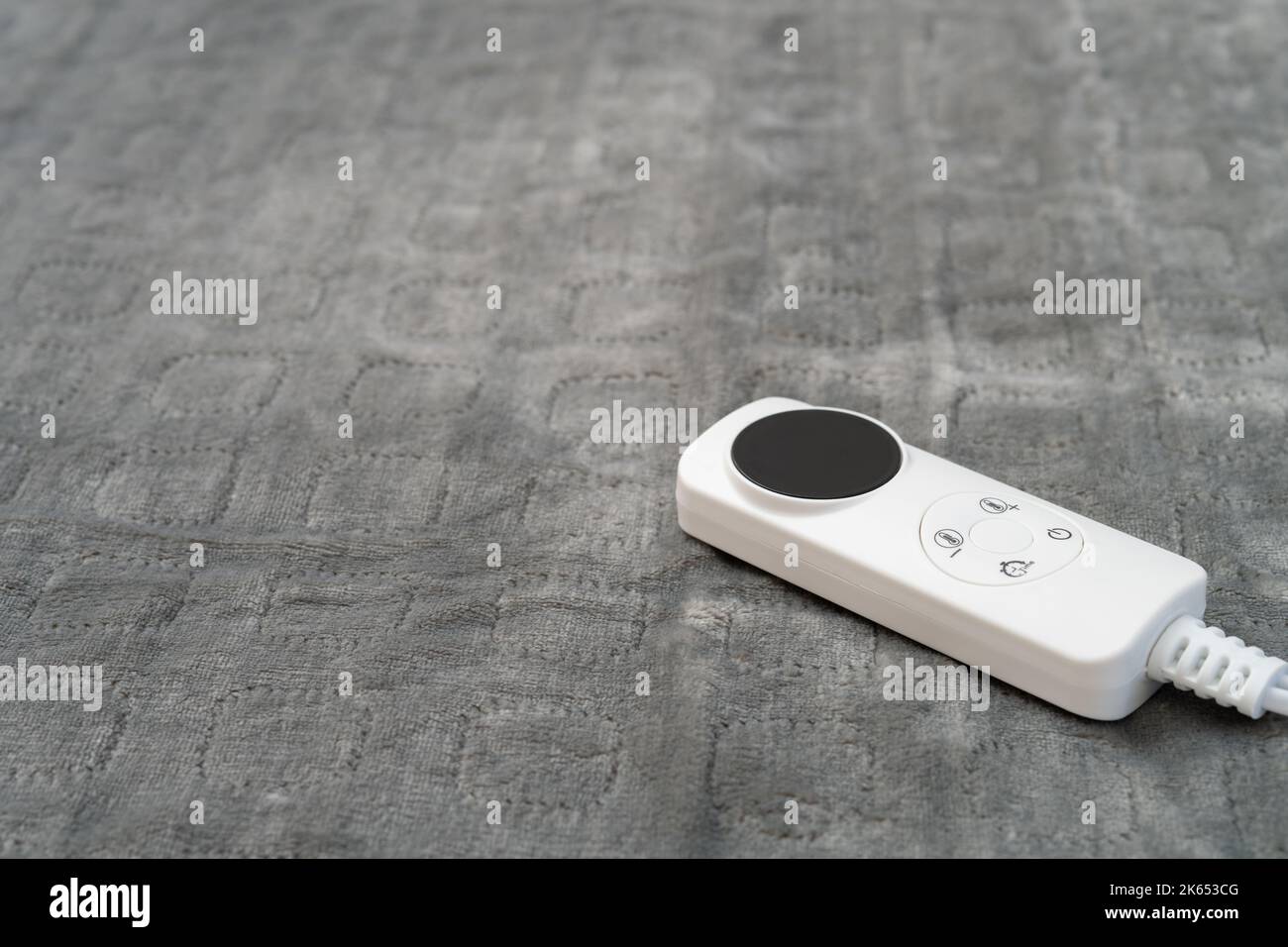 electric blanket with controller at horizontal composition Stock Photo ...