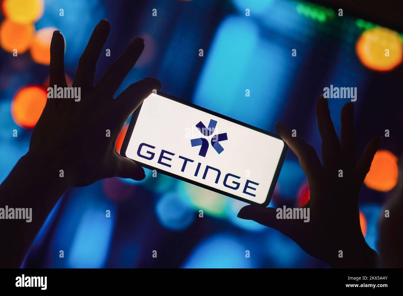 In this photo illustration, the Getinge Group logo is displayed on a smartphone screen. (Photo ...