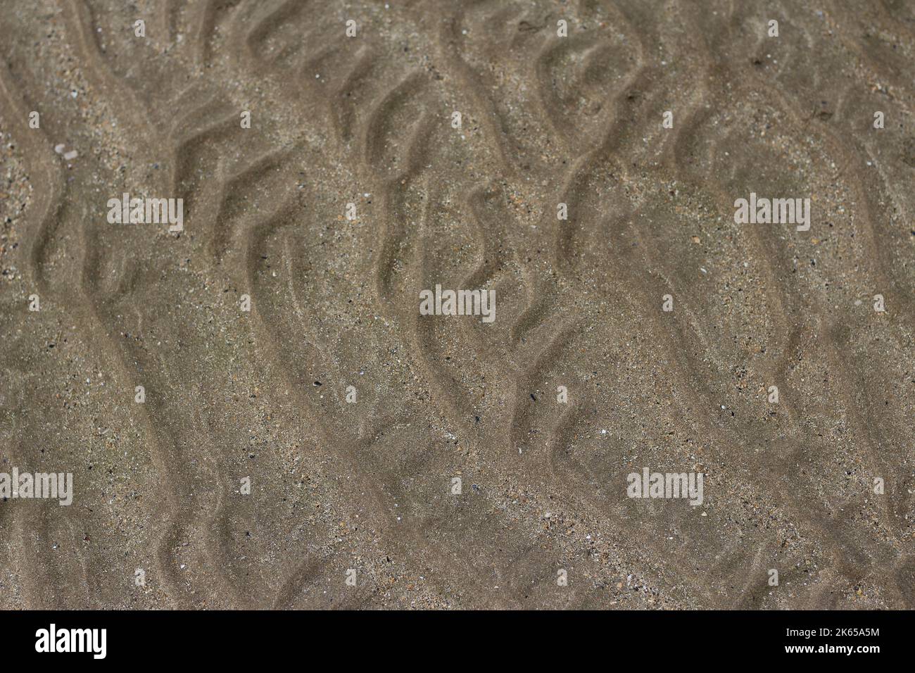 A top view of a sandy texture with a pattern Stock Photo - Alamy