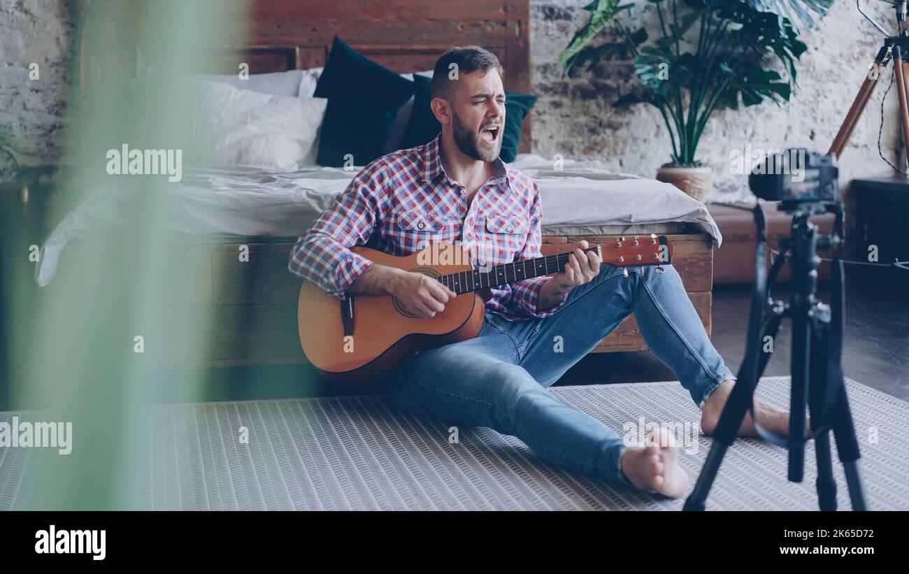 Male blogger recording tutorial hi-res stock photography and images - Alamy