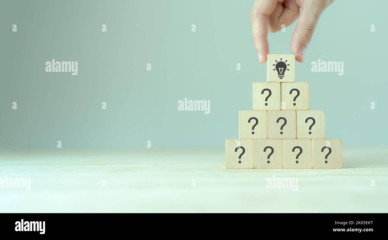 Question marks and light bulb symbolizing idea or solution. Problem solving skill, creativity ...