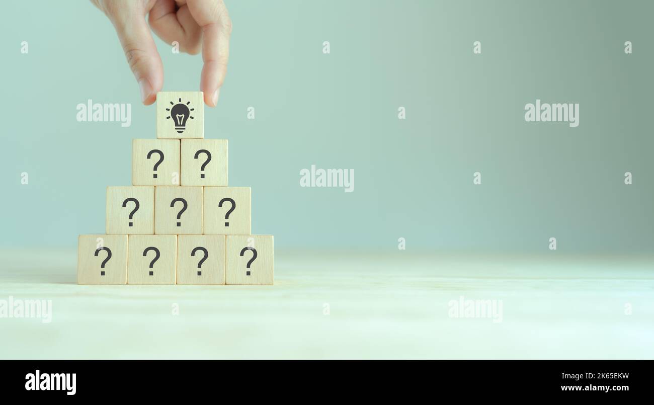 Question marks and light bulb symbolizing idea or solution. Problem ...