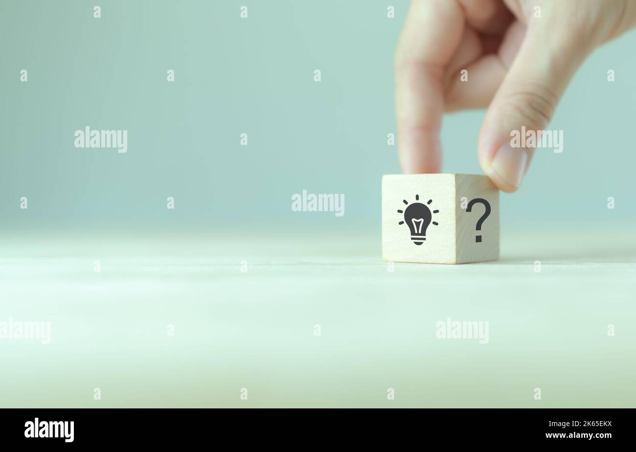 Question marks and light bulb symbolizing idea or solution. Problem solving skill, creativity ...