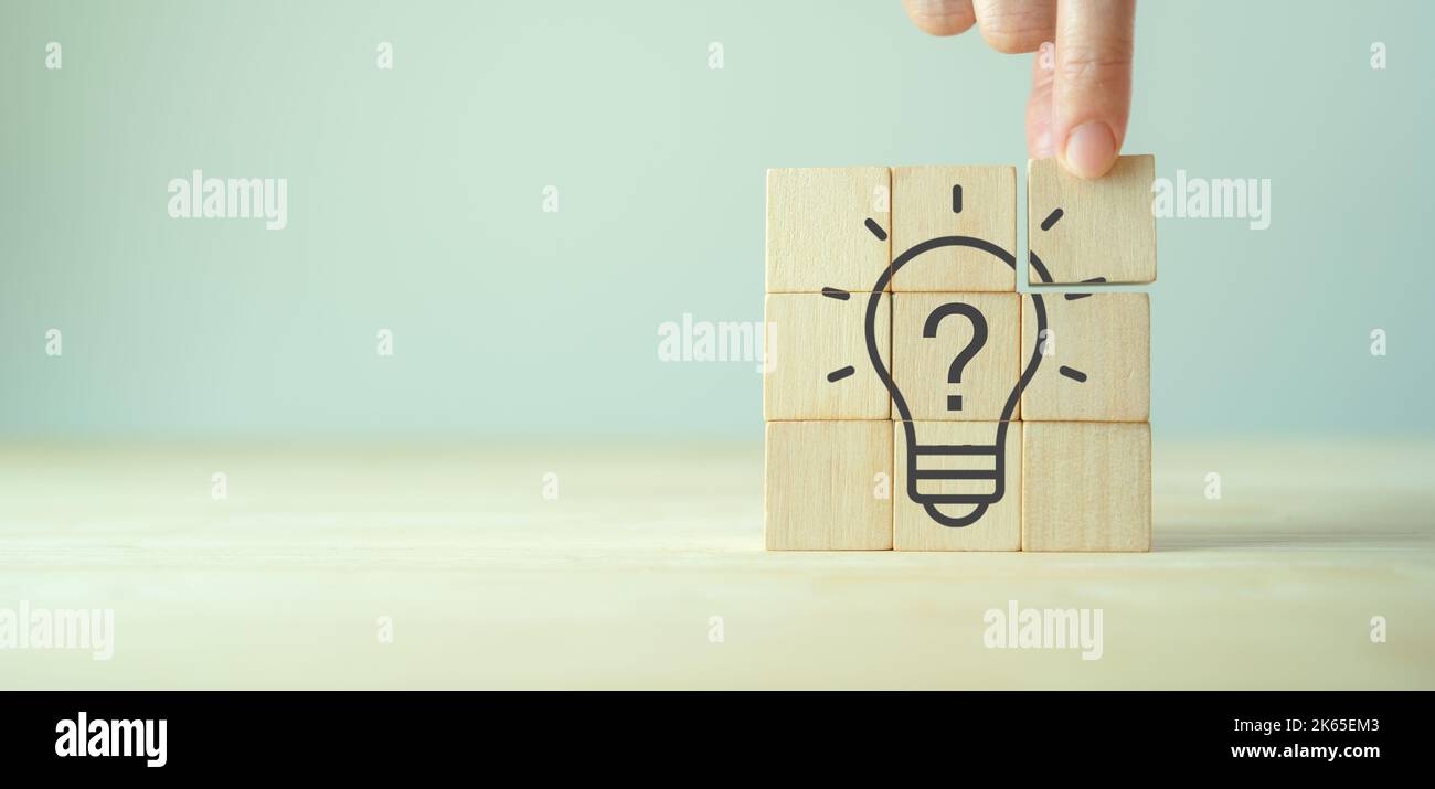 Question marks and light bulb symbolizing idea or solution. Problem ...