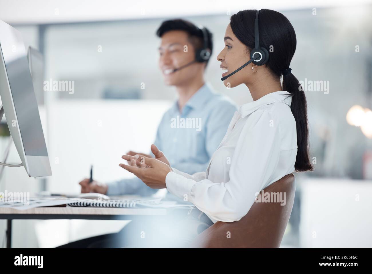 Call center, communication and employee talking to people on the ...