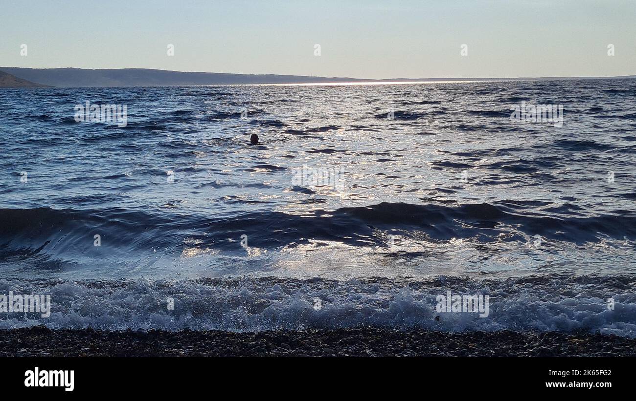 A scenic view of sea waves washing the beach in Seline, Croatia Stock ...