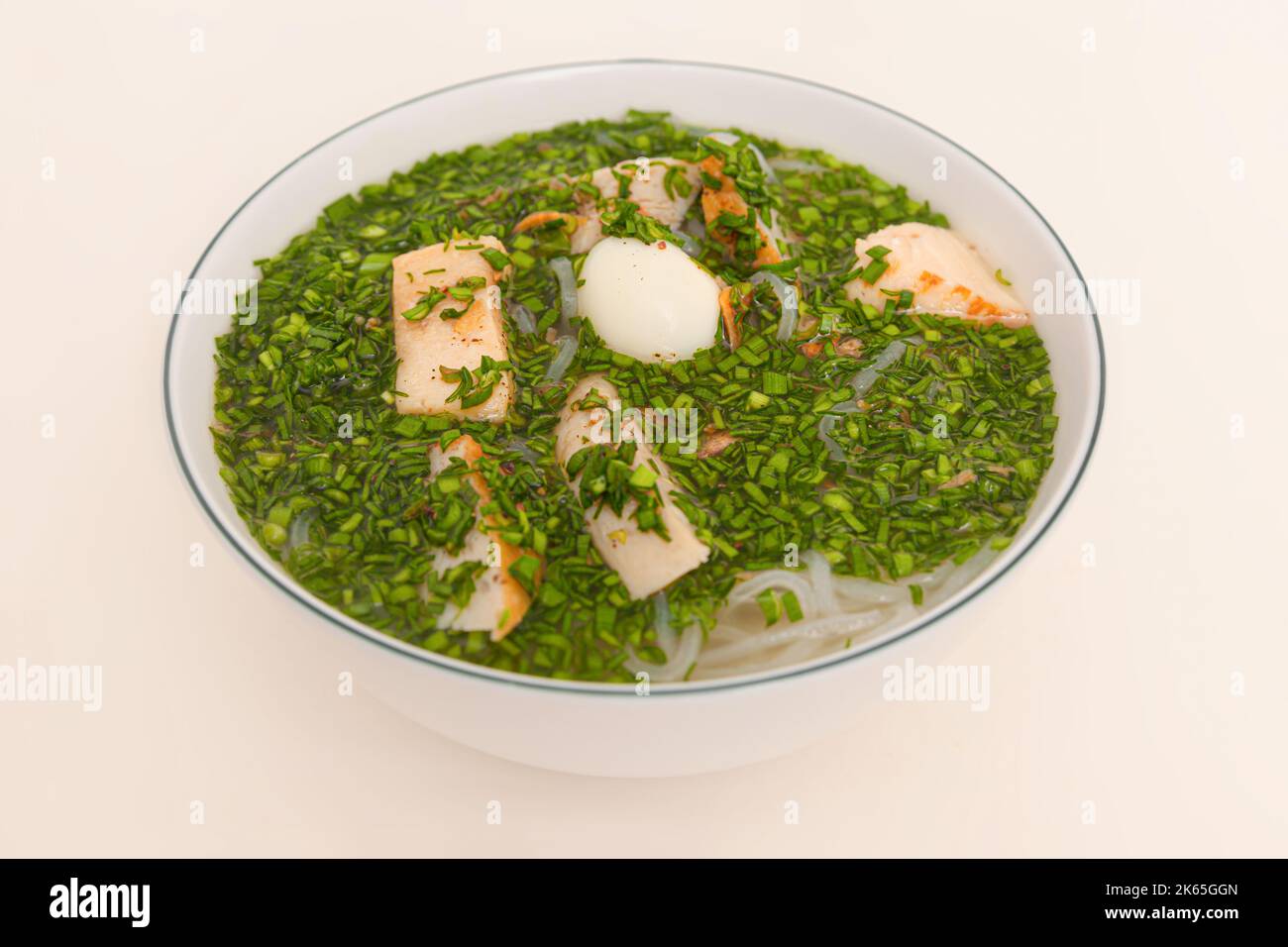 Banh canh cha ca, Rice Noodles soup with fish cake and chives ...