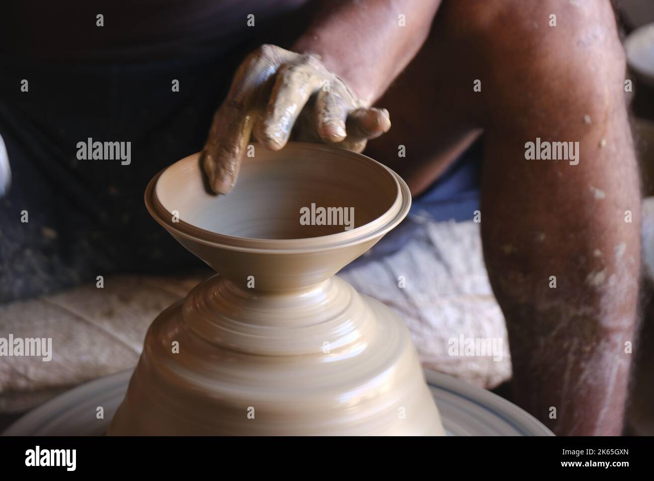9 October 2022, Pune, India, Indian potter making Diya (oil lamps) or ...