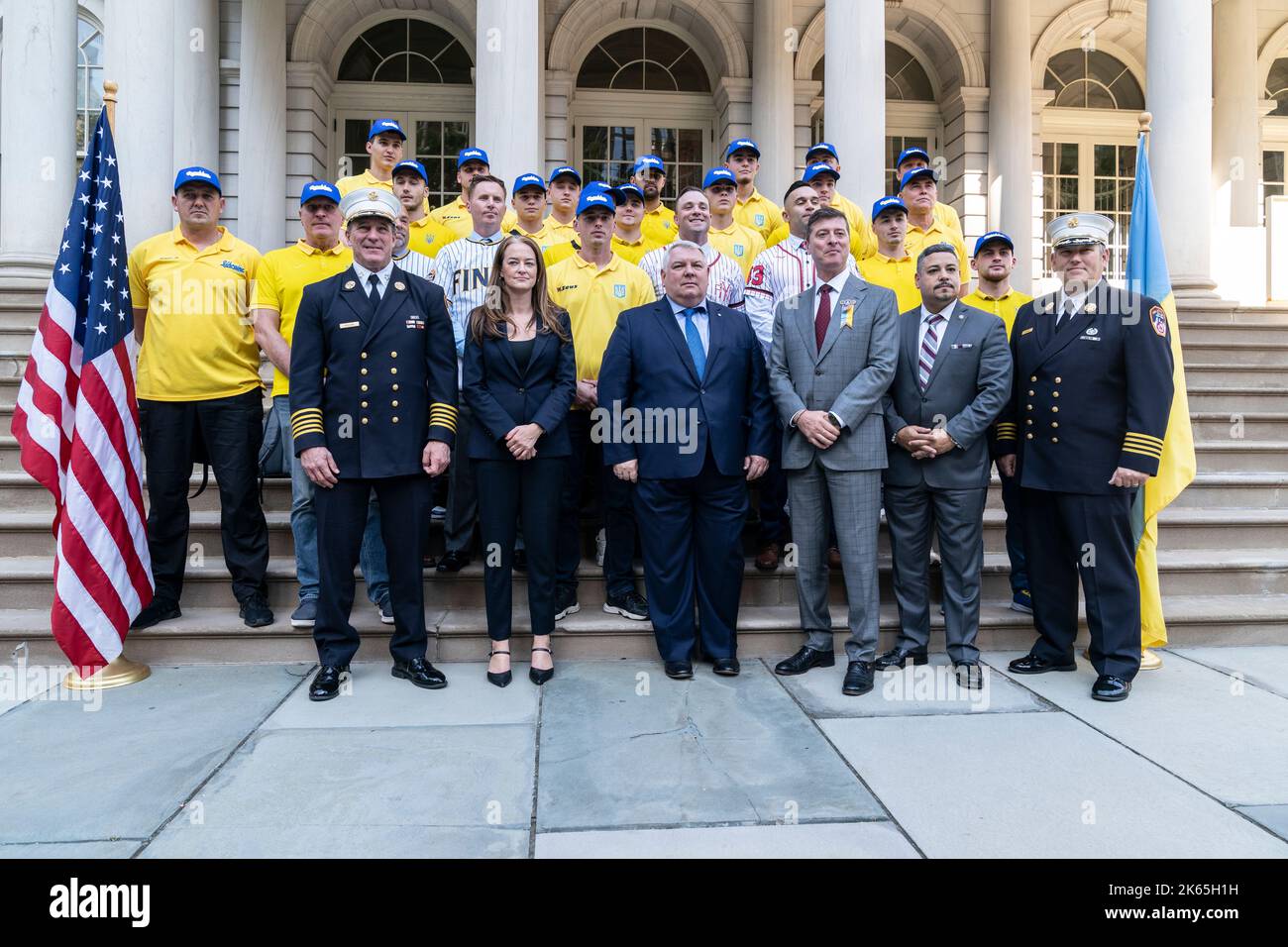 Ukrainian national baseball team and officials from FDNY and NYPD pose ...