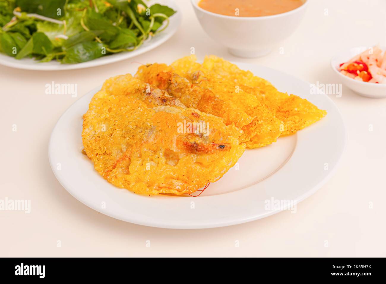 Banh xeo, Vietnamese Crêpes or Pancakes with pork, shrimp, onions ...