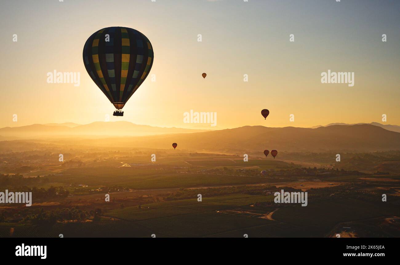 Hot air ballooning over Temecula one early sunny morning Stock Photo ...