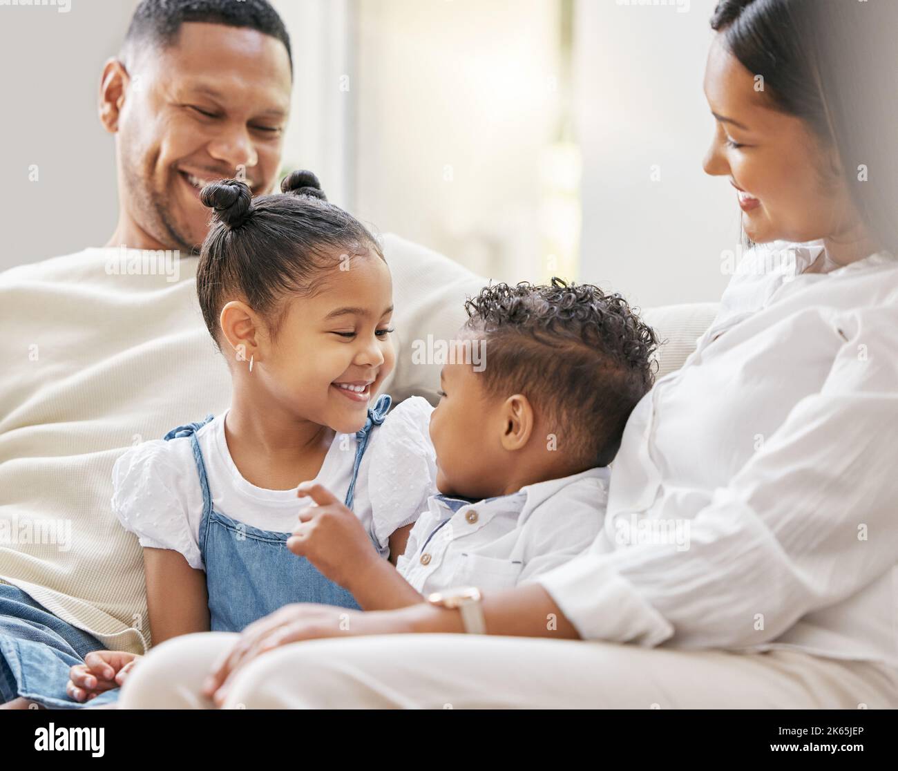 Family is love, smiles and everything in between. a young family ...