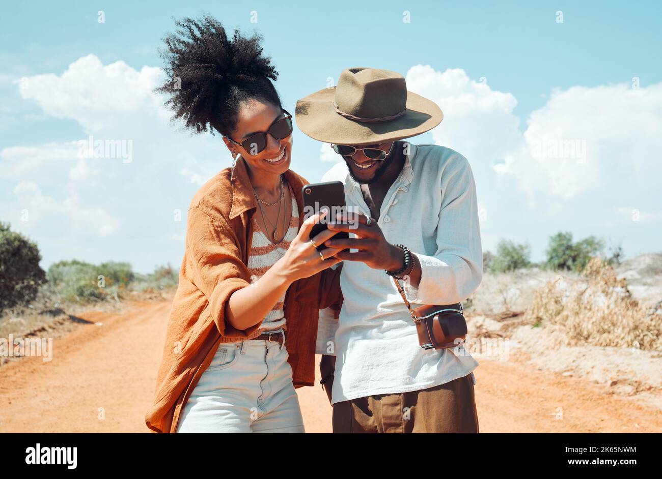 Black couple with phone, travel and adventure, happy outdoors in ...