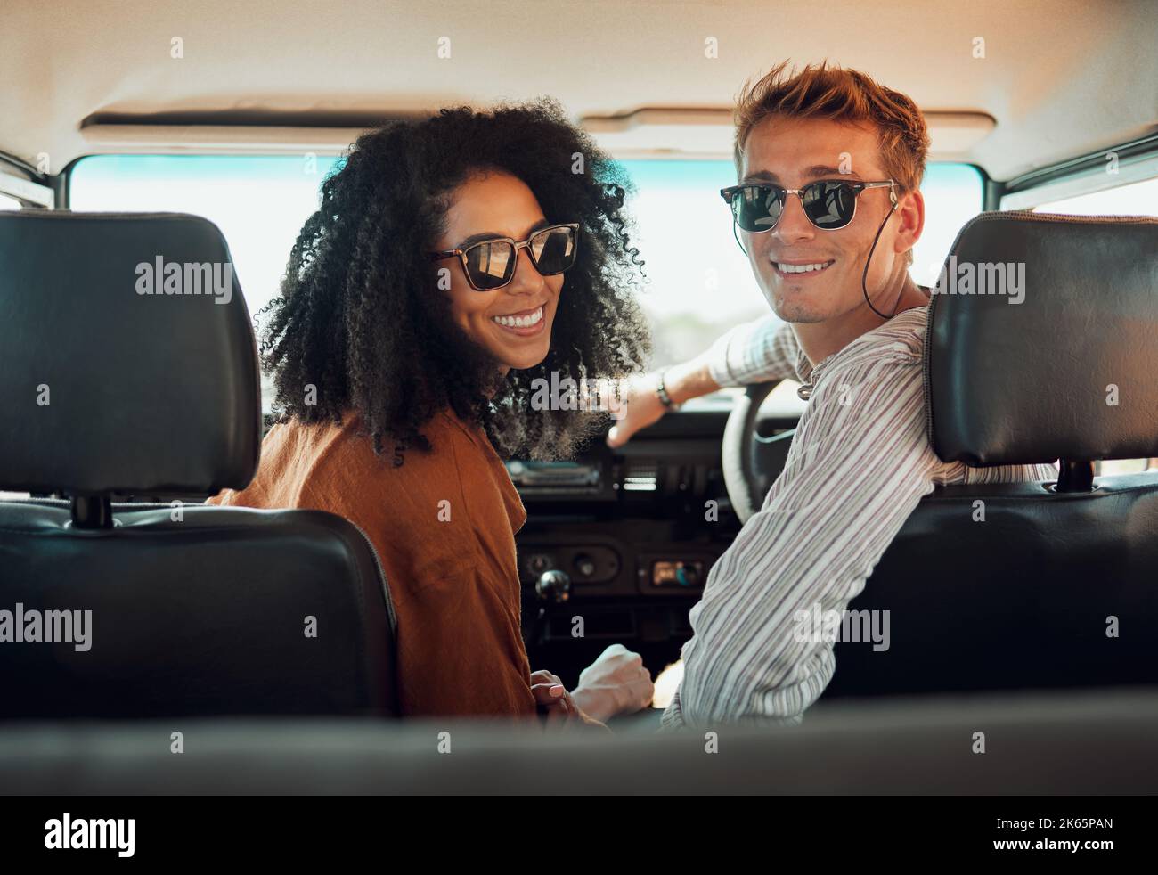 Couple, travel and adventure, happy in car on roadtrip during summer ...