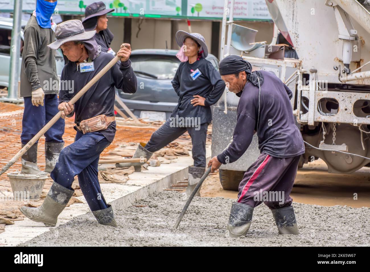 Construction workers doing installation hi-res stock photography and ...