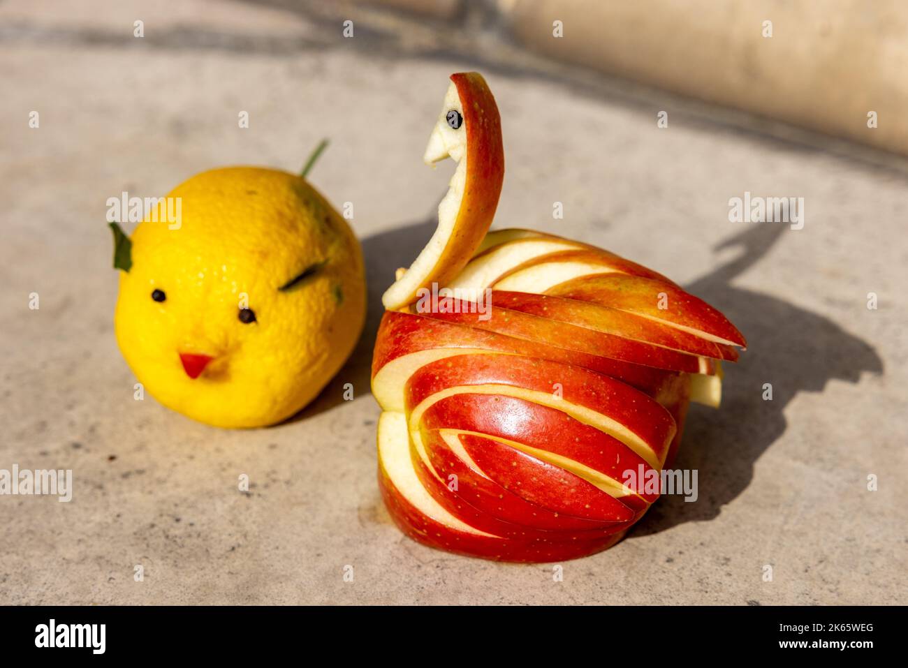 Animal-shaped decorations made of fruits Stock Photo - Alamy