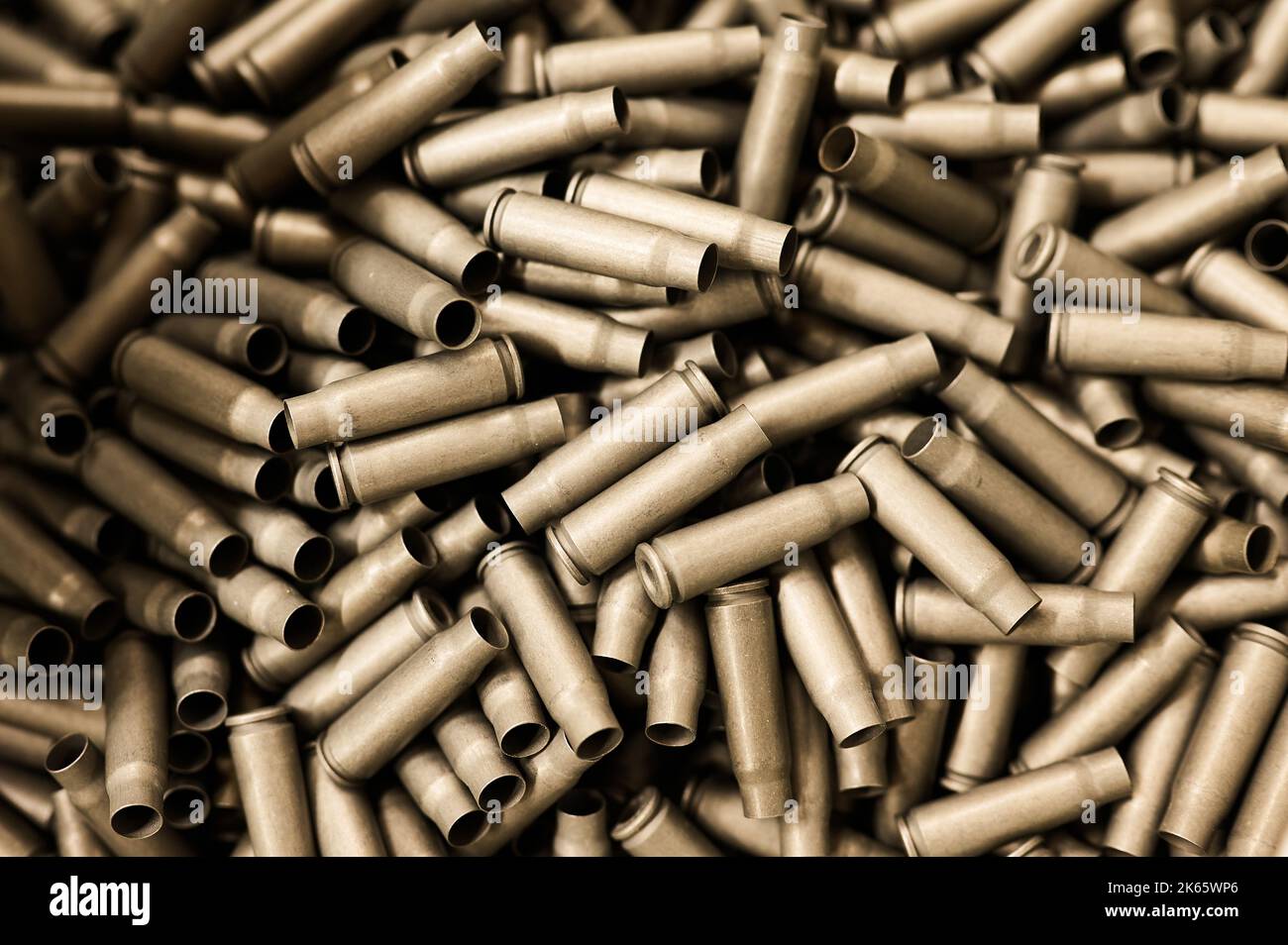 Grey shell casings in container at armor production plant Stock Photo ...