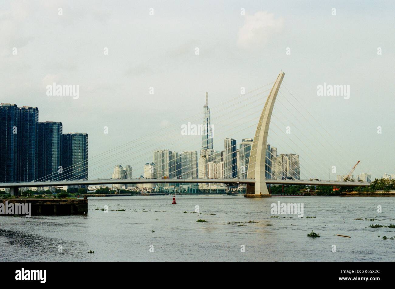 The famous Cau Thu Thiem 2 bridge in Vietnam with modern buildings in ...