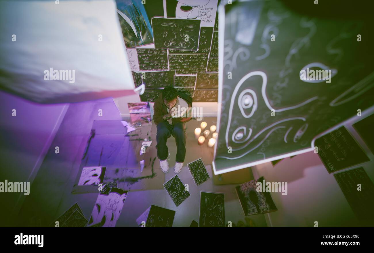 Asian man with mental disorder sitting alone at night feeling paranoid ...