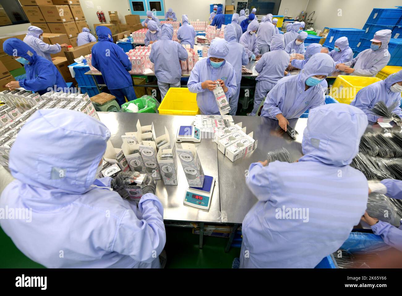 HAI'AN, CHINA - OCTOBER 12, 2022 - Employees produce masks for export ...