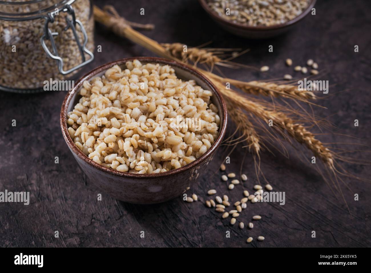 Bowl of cooked peeled barley grains porridge Stock Photo - Alamy