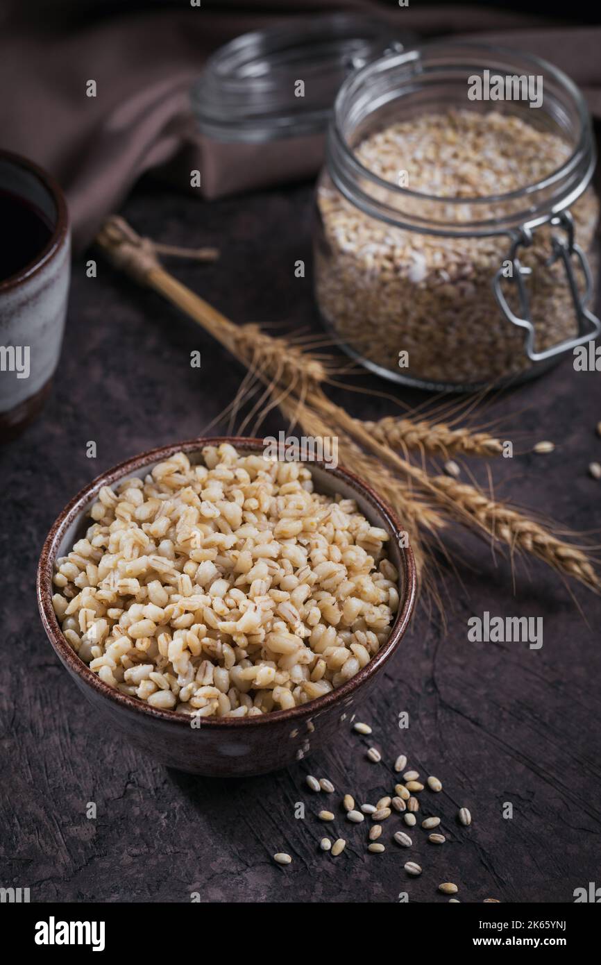 Bowl of cooked peeled barley grains porridge Stock Photo - Alamy