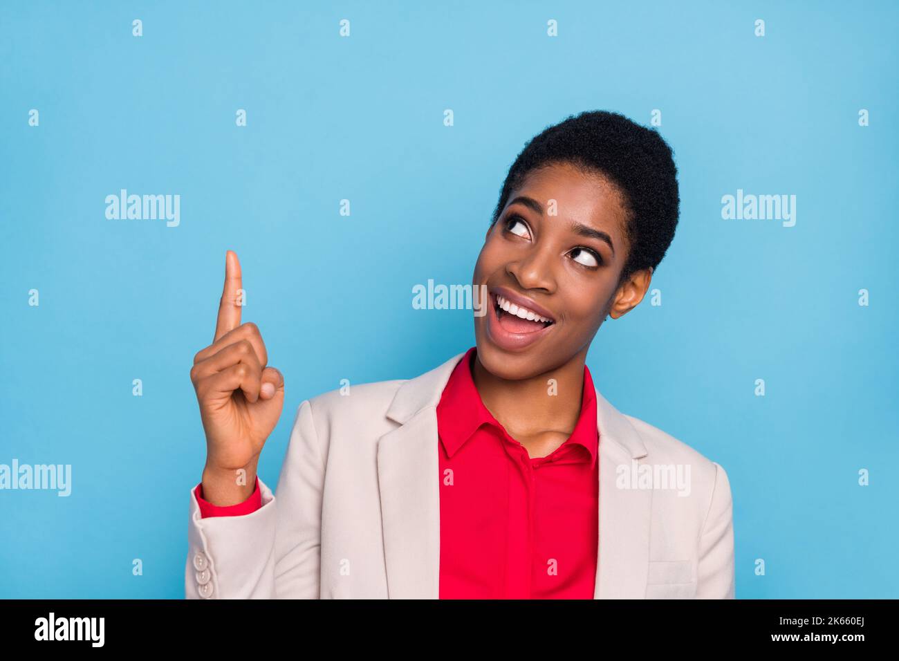 Portrait of positive person look indicate finger empty space isolated ...