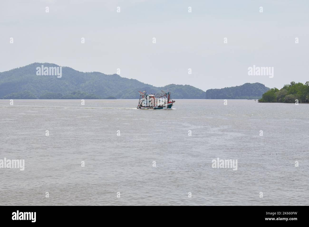 Fishing boat on the sea Stock Photo - Alamy