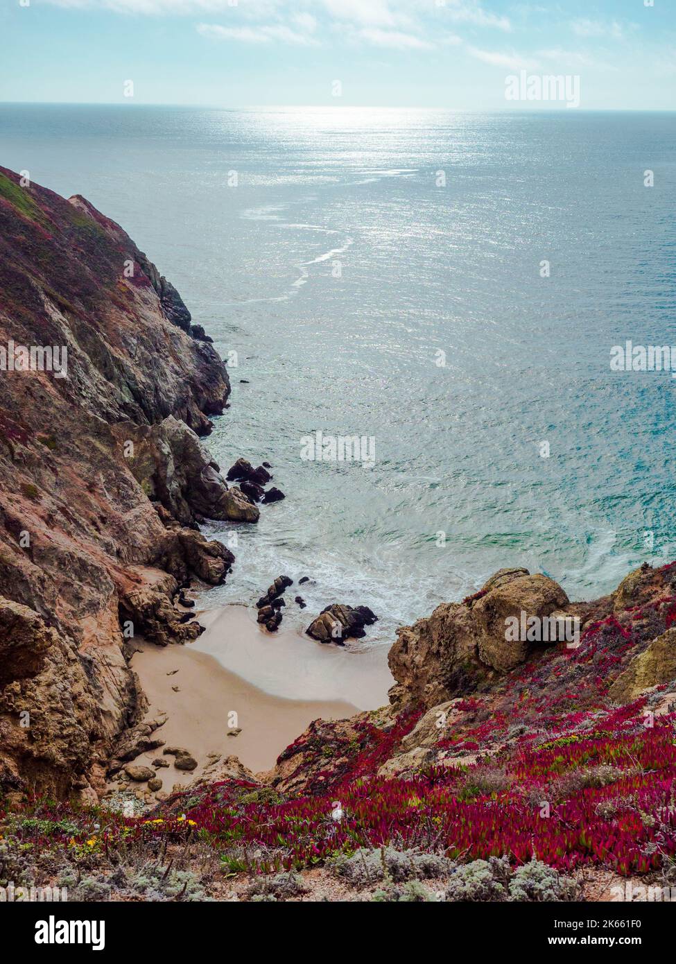 A vertical shot of waves covering the coastline Stock Photo - Alamy