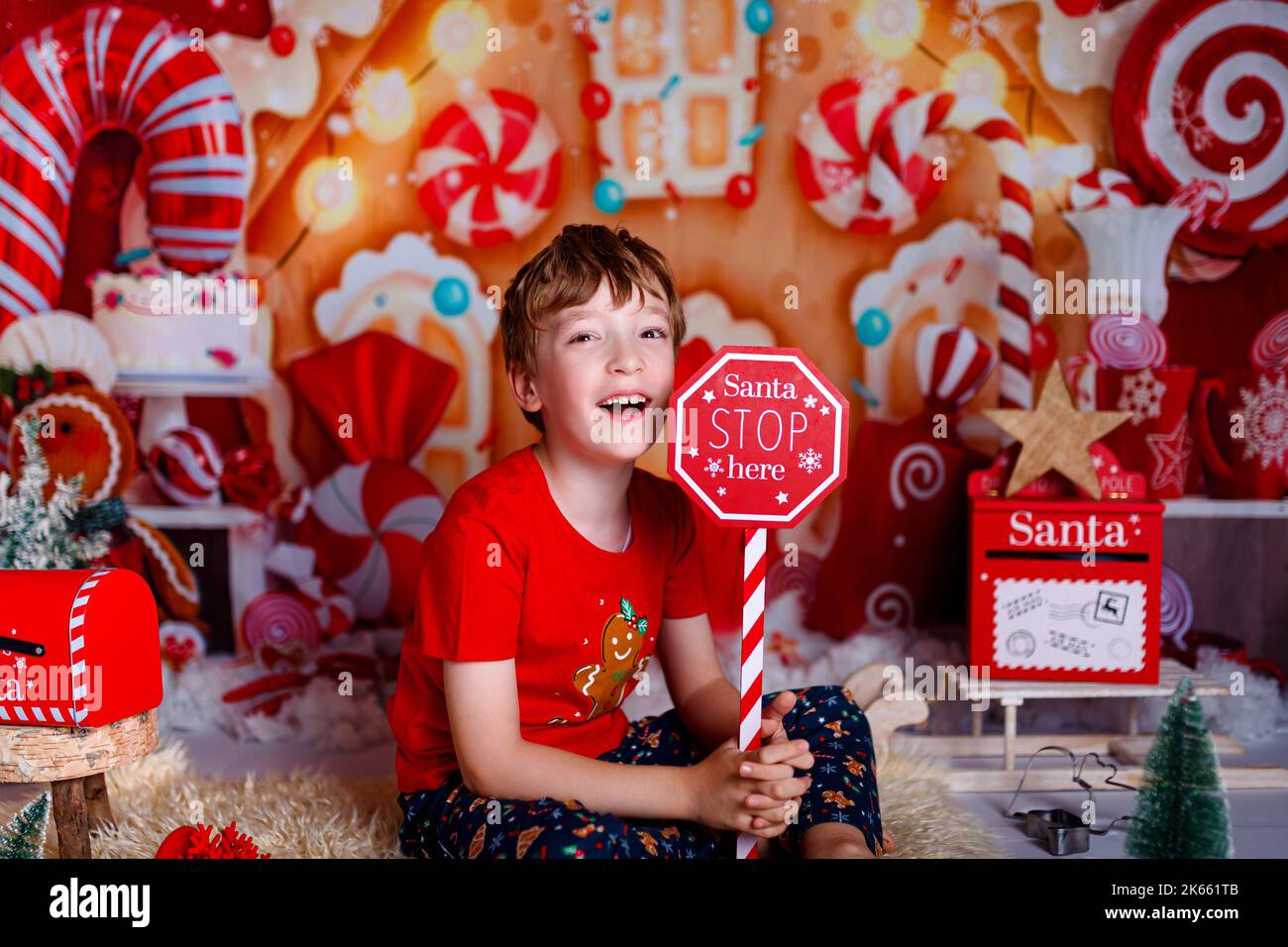Kid reading a book at Christmas. Happy xmas and New Year, winter ...