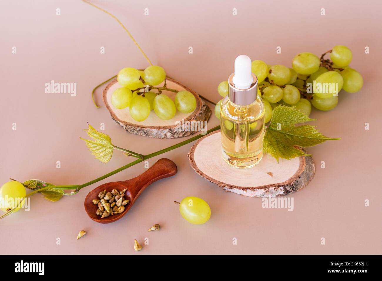 cosmetic from grape seeds for facial skin care in a transparent bottle ...