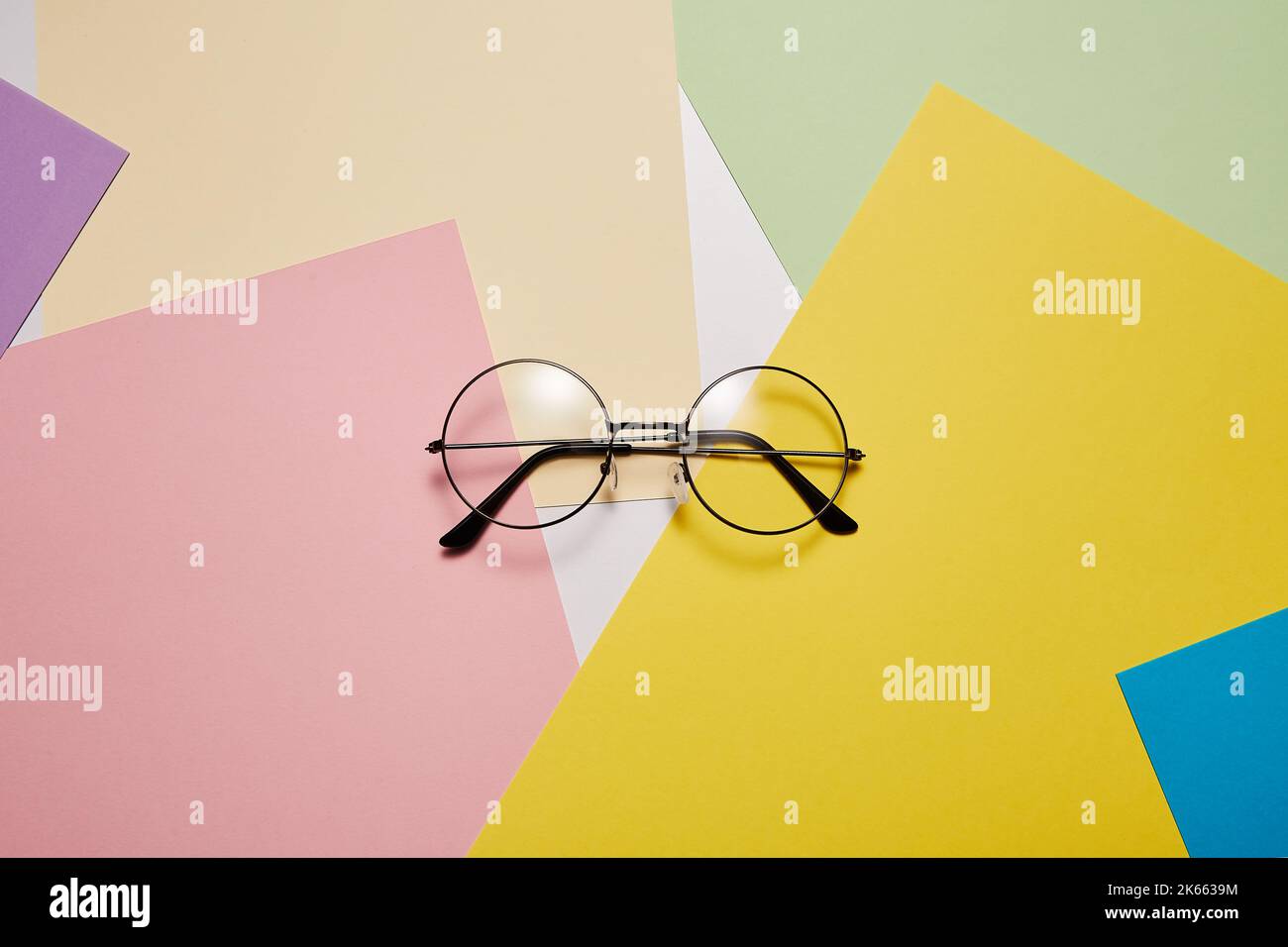 Eyeglasses with metal round rim is on abstract background Stock Photo ...