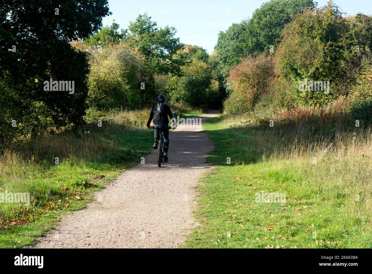 A cyclist on the Offchurch Greenway footpath/cycleway, Warwickshire ...