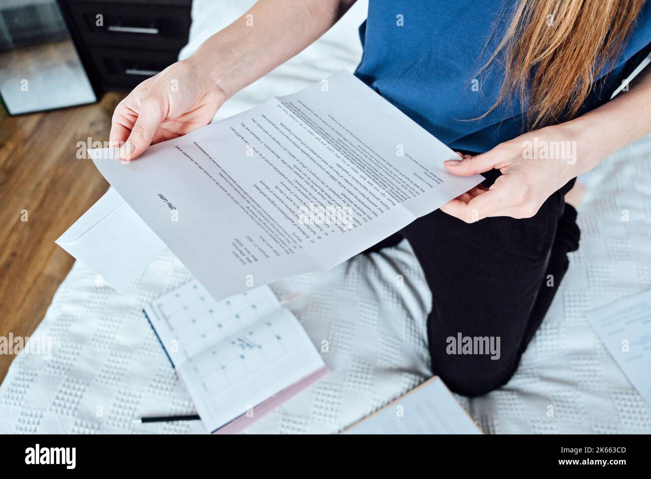 Happy excited woman student customer reading offer letter with good ...