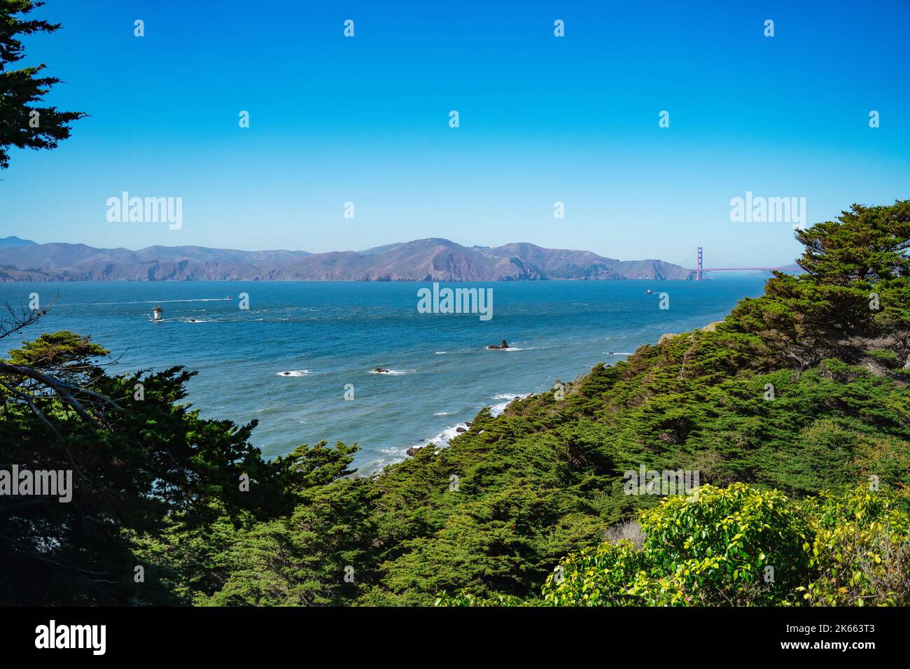 Golden gate bridge from lands end trail deadman's point on a bright ...