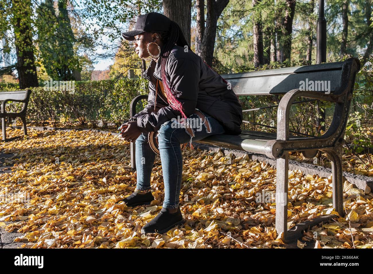 Girl Sitting Down On Bench