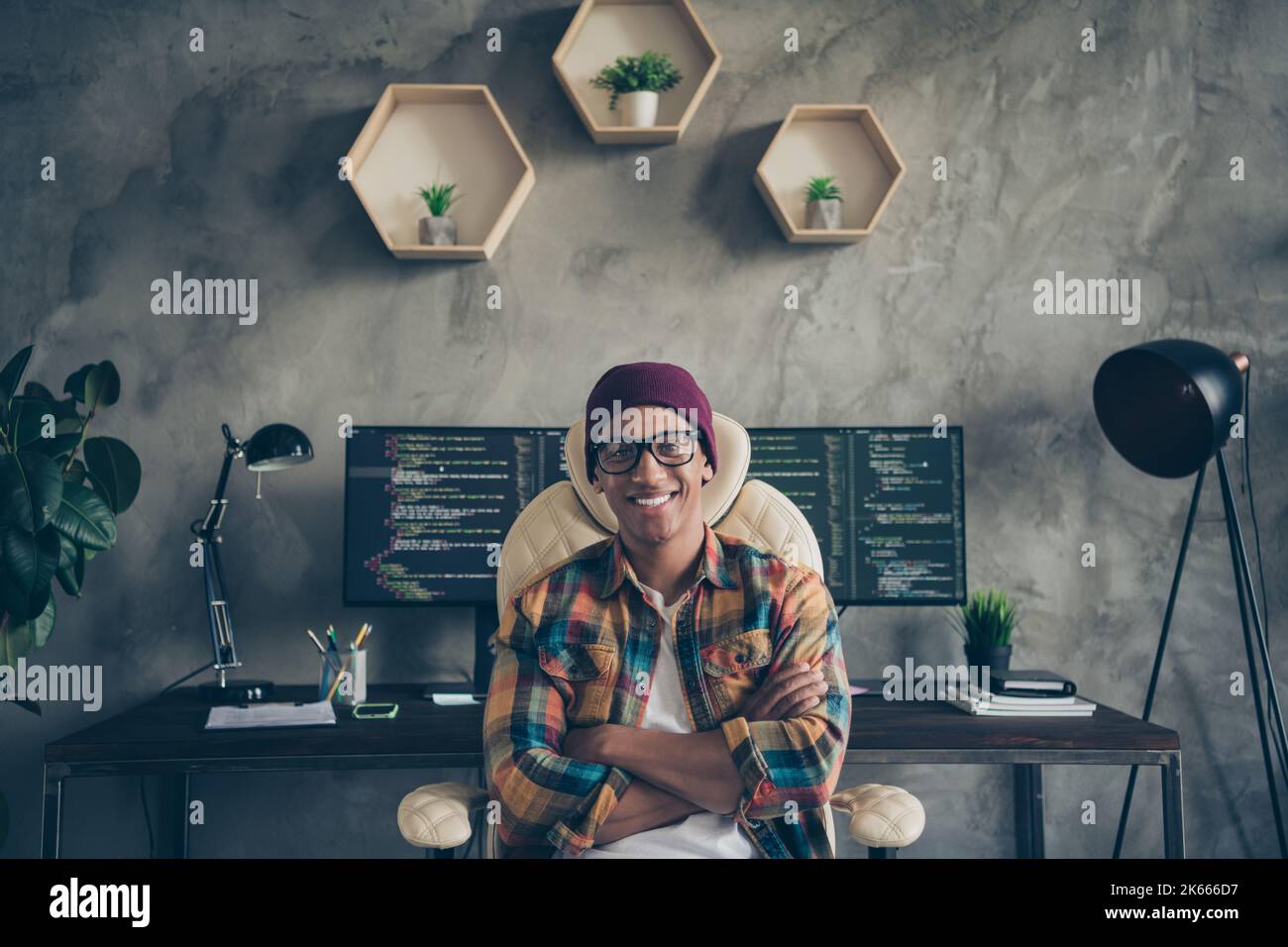 Photo of clever confident programmer wear spectacles hat arms crossed ...