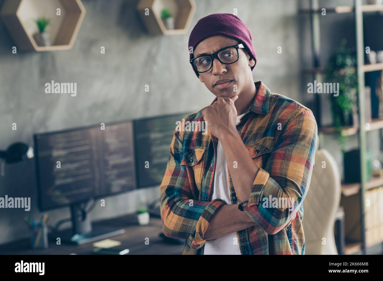 Photo of cool ponder programmer wear spectacles hat thinking debagging ...