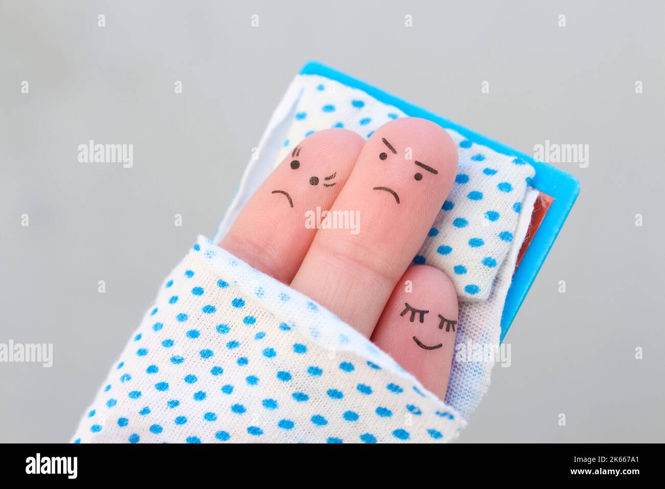 Fingers art of family sleep together. Concept of child prevents parents ...