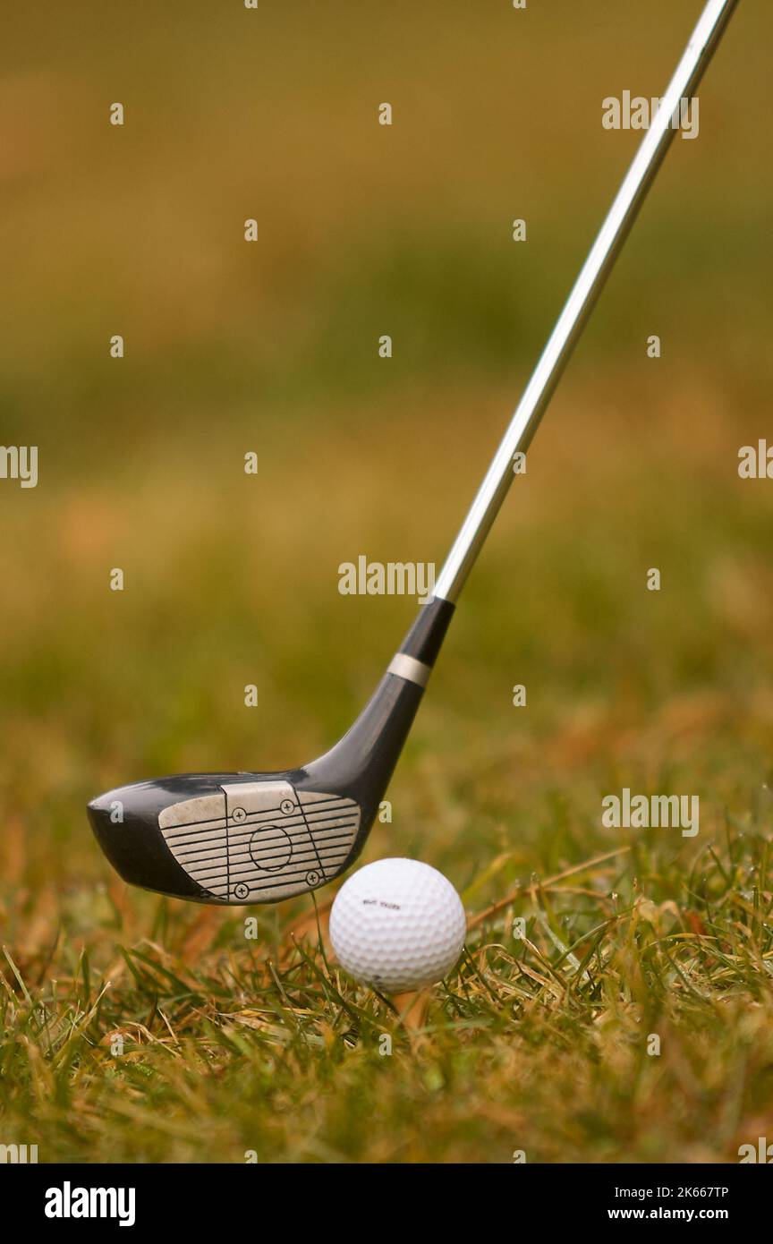 Detail of golf club hitting a ball Stock Photo - Alamy