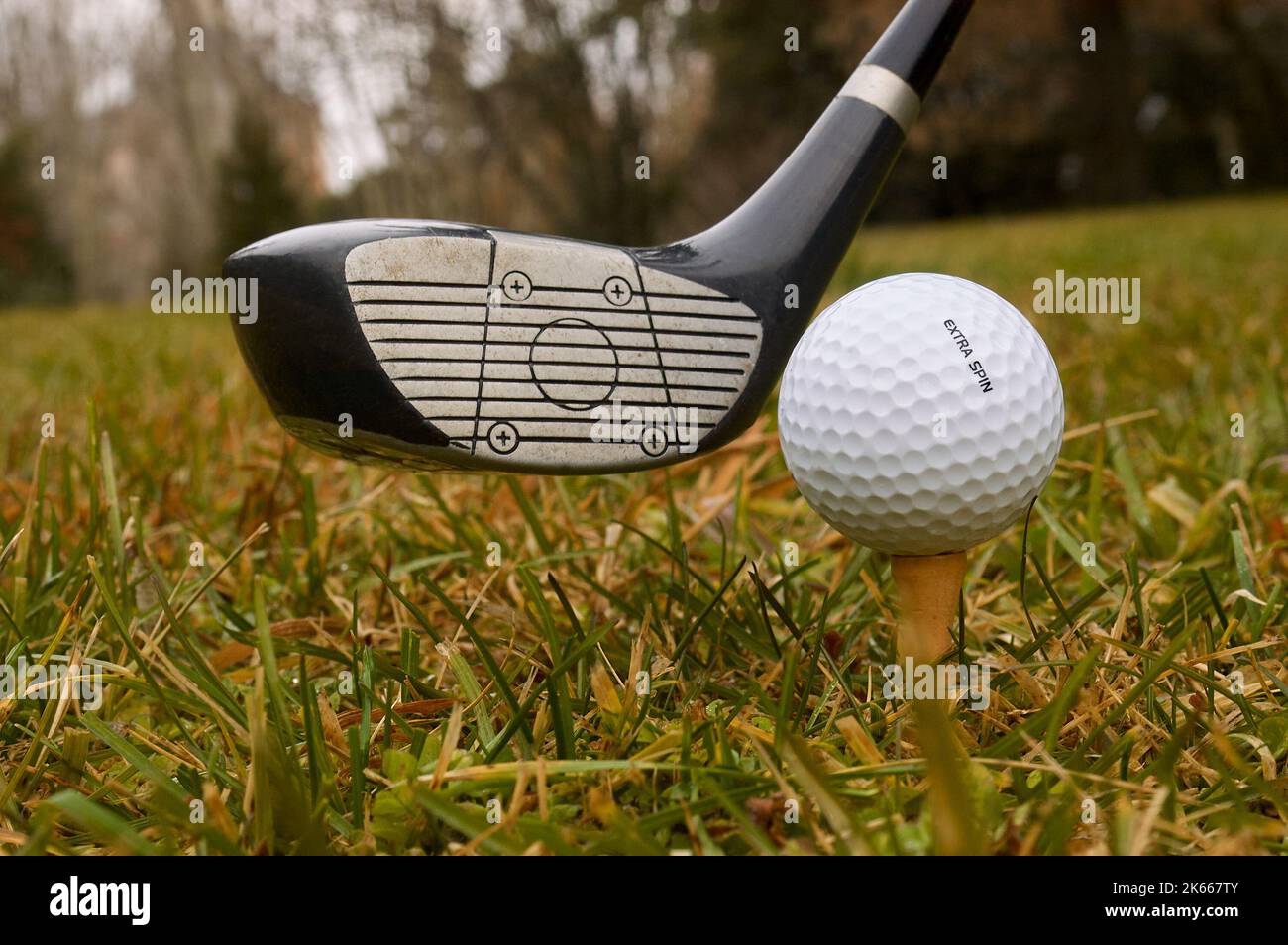 Detail of golf club hitting a ball Stock Photo - Alamy