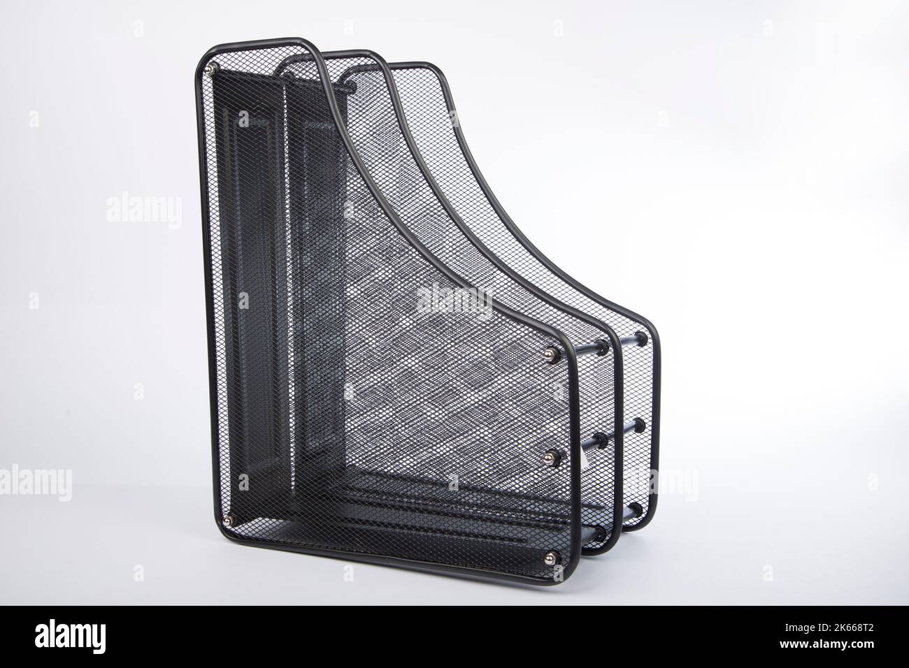 A black mesh desktop file holder isolated on white background Stock ...